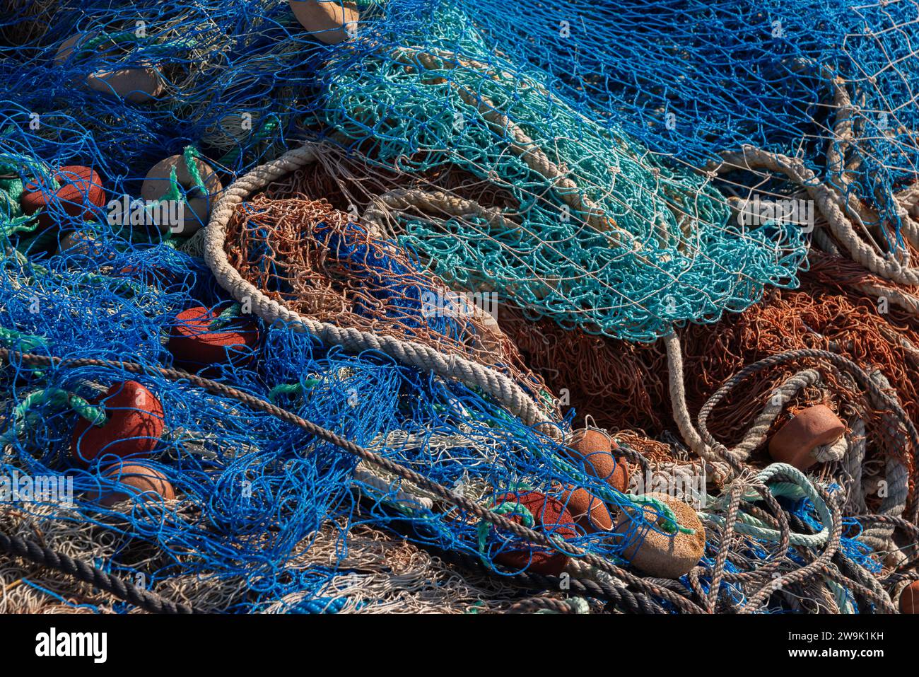 Industrial Fishing Equipment Fishnets and Fishing Lines lying on ...