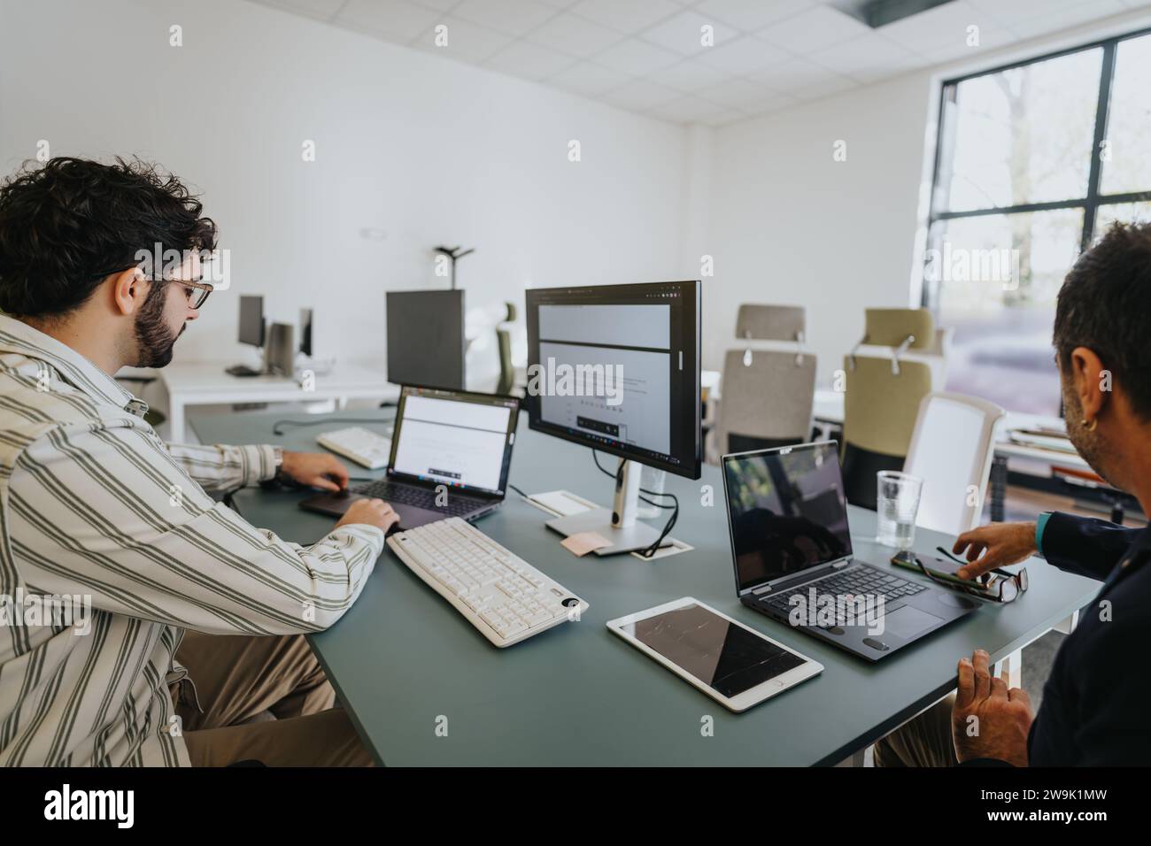 Multi generational, different aged group of creative businesspeople ...