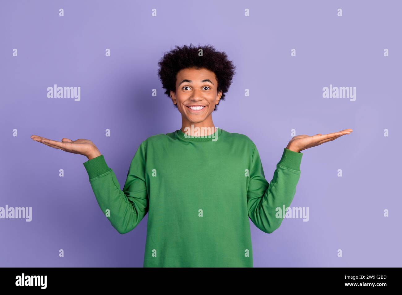 Photo of funky cool guy wear green pullover showing arms scales empty ...