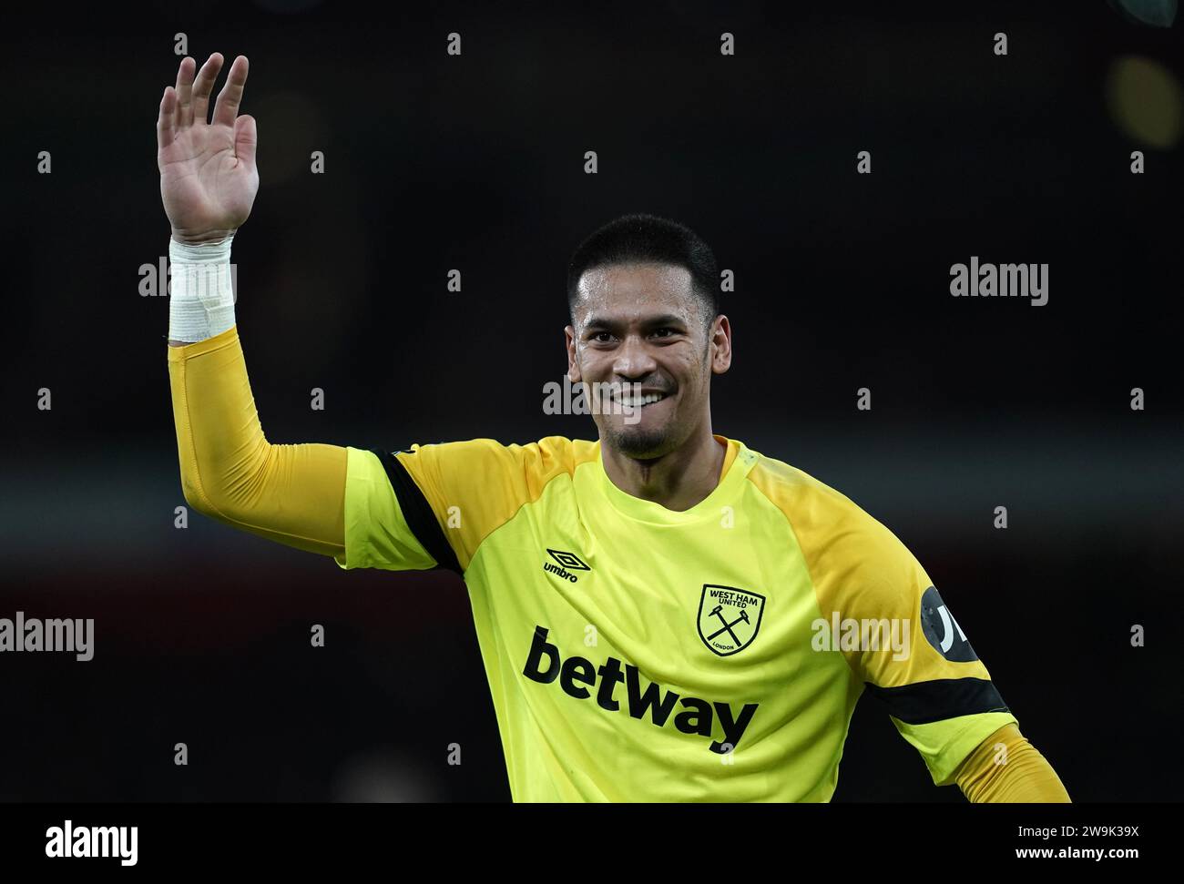 West Ham United goalkeeper Alphonse Areola gestures to the fans after ...