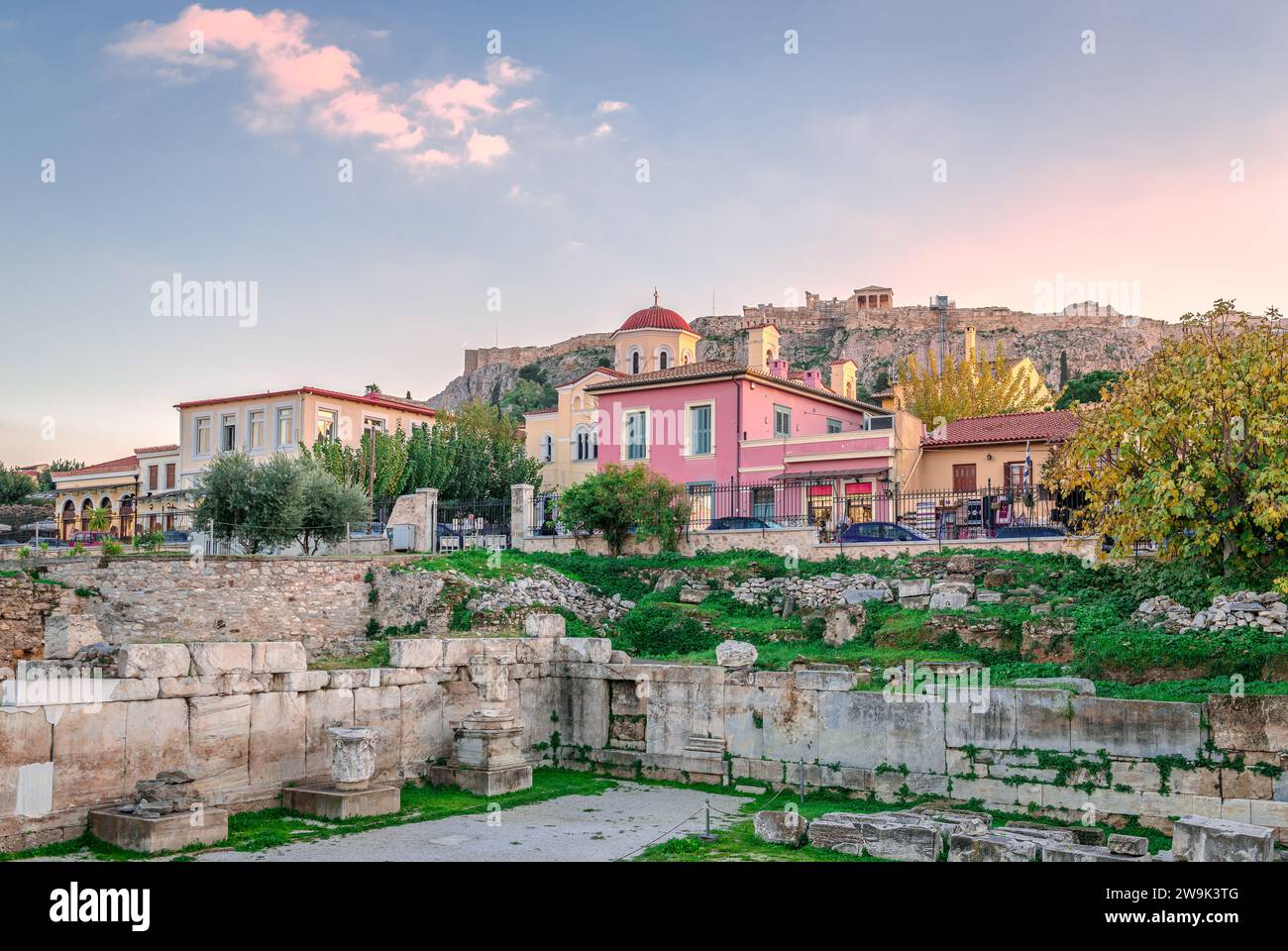 The ruins of Hadrian's Library, with the historic district of Plaka and ...