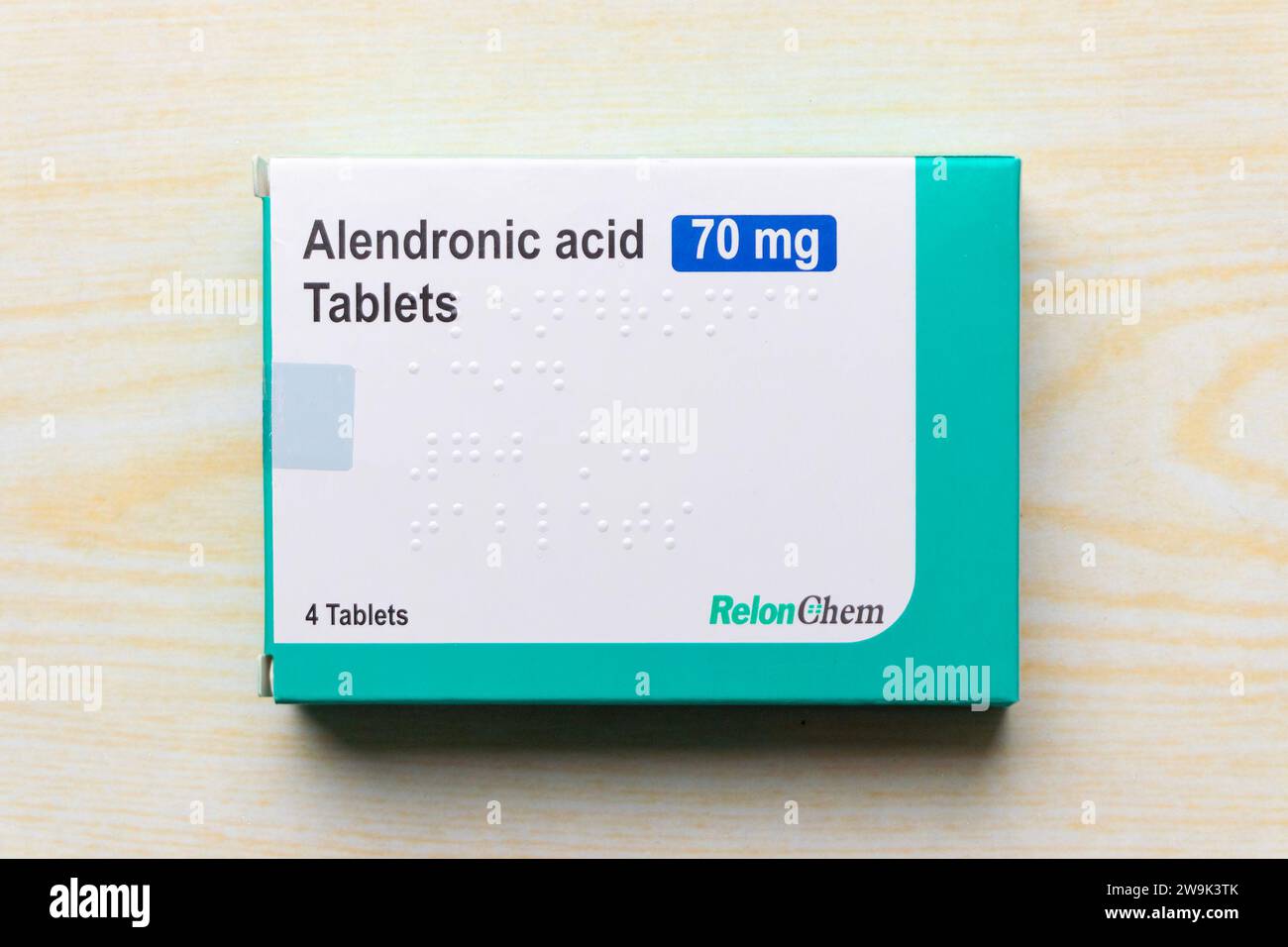 Relon Chem 70mg Alendronic acid bisphosphonate in box isolated on wood ...