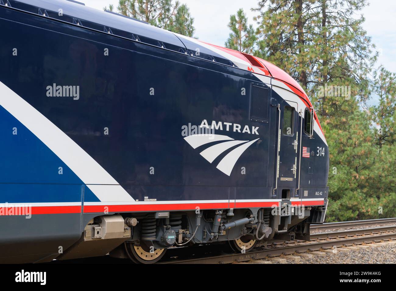 Leavenworth, WA, USA - September 22, 2023; Closeup of Amtrak ALC-42 locomotive on curved track ...