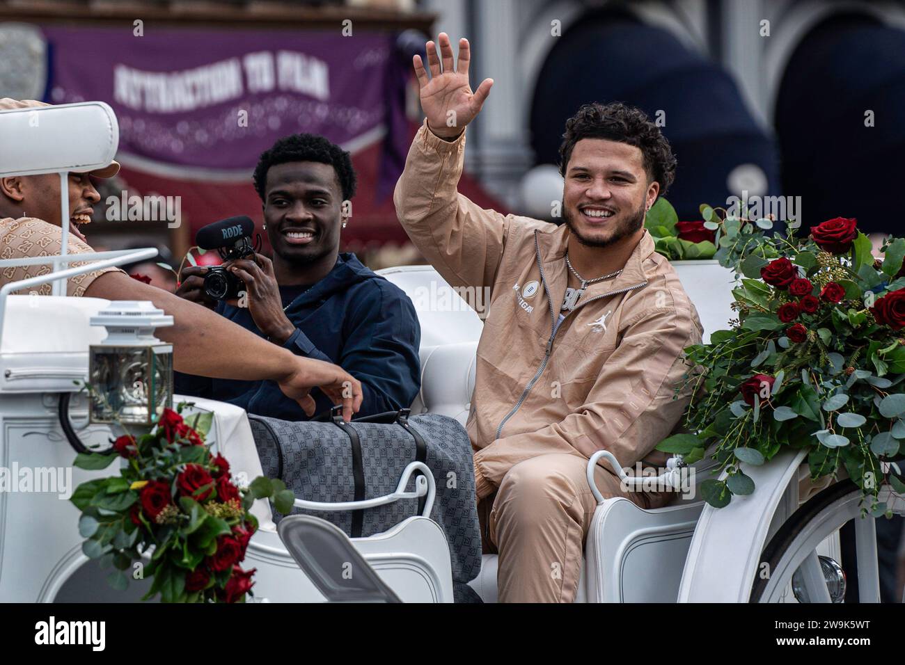 Michigan Wolverines running back Blake Corum (right) and defensive back ...