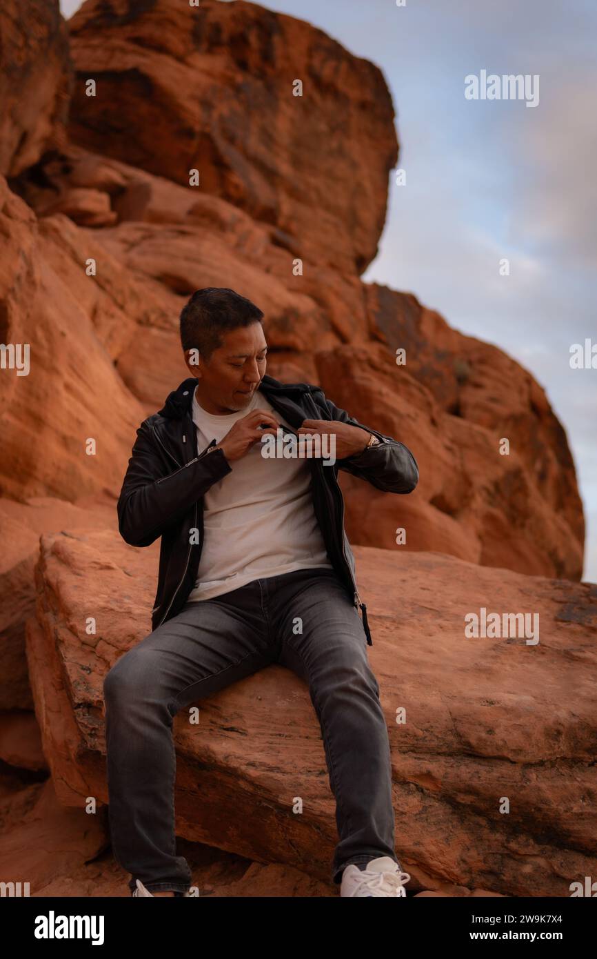 Male Model in the desert during the sunset Stock Photo - Alamy