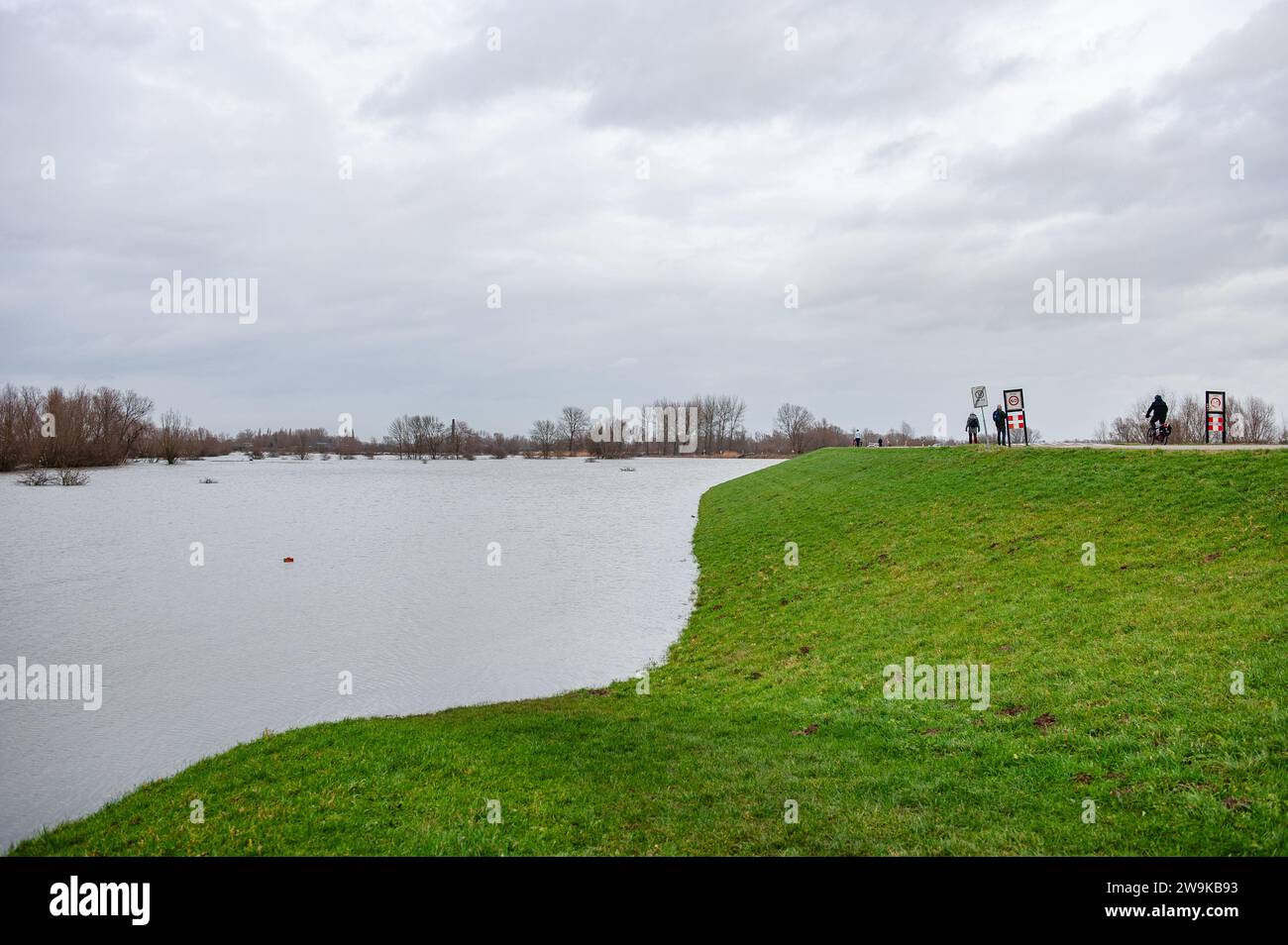 People are seen walking along one of the dikes. The rainy Christmas ...