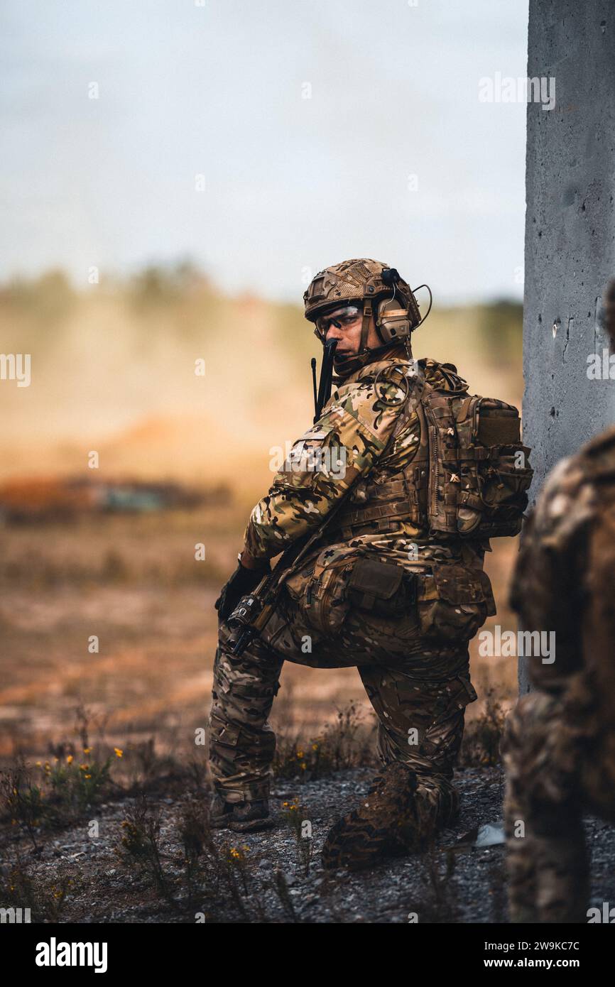 A Ranger assigned to the 75th Ranger Regiment executes movement to ...