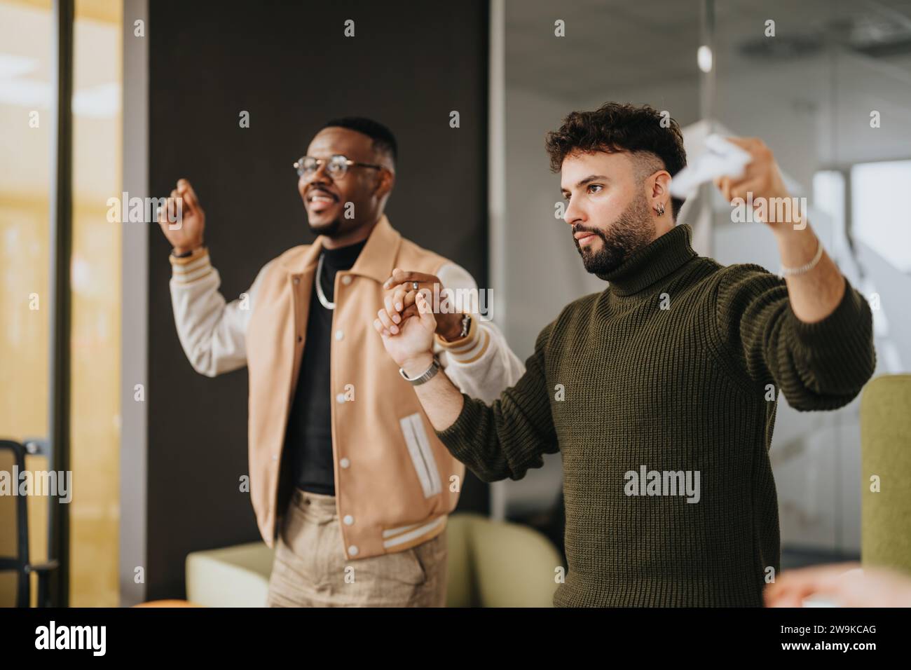 Traditional dance at work. Colleagues unite, having fun and a good time ...