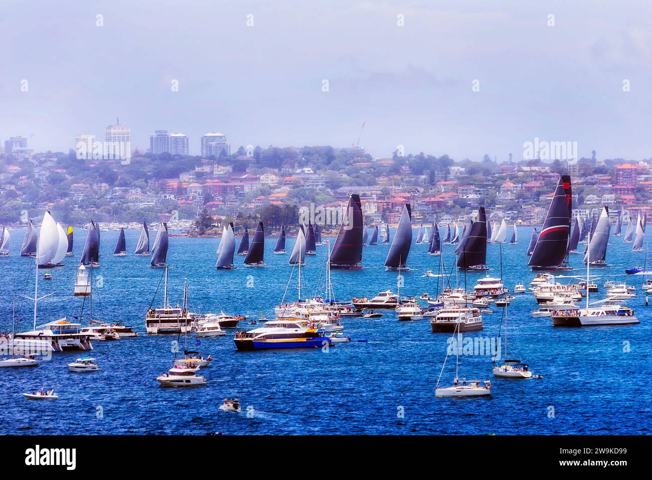 Massive flotilla of yachts boats and ships on Sydney harbour at start ...