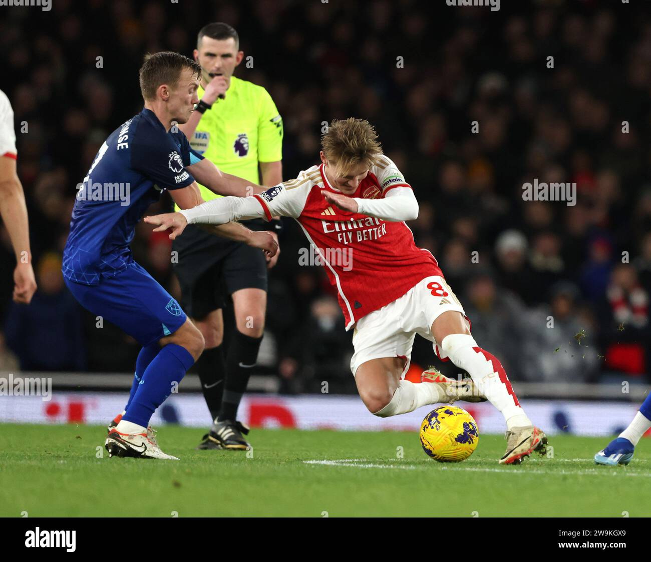 London, UK. 28th Dec, 2023. James Ward-Prowse (WHU) Martin Odegaard (A ...