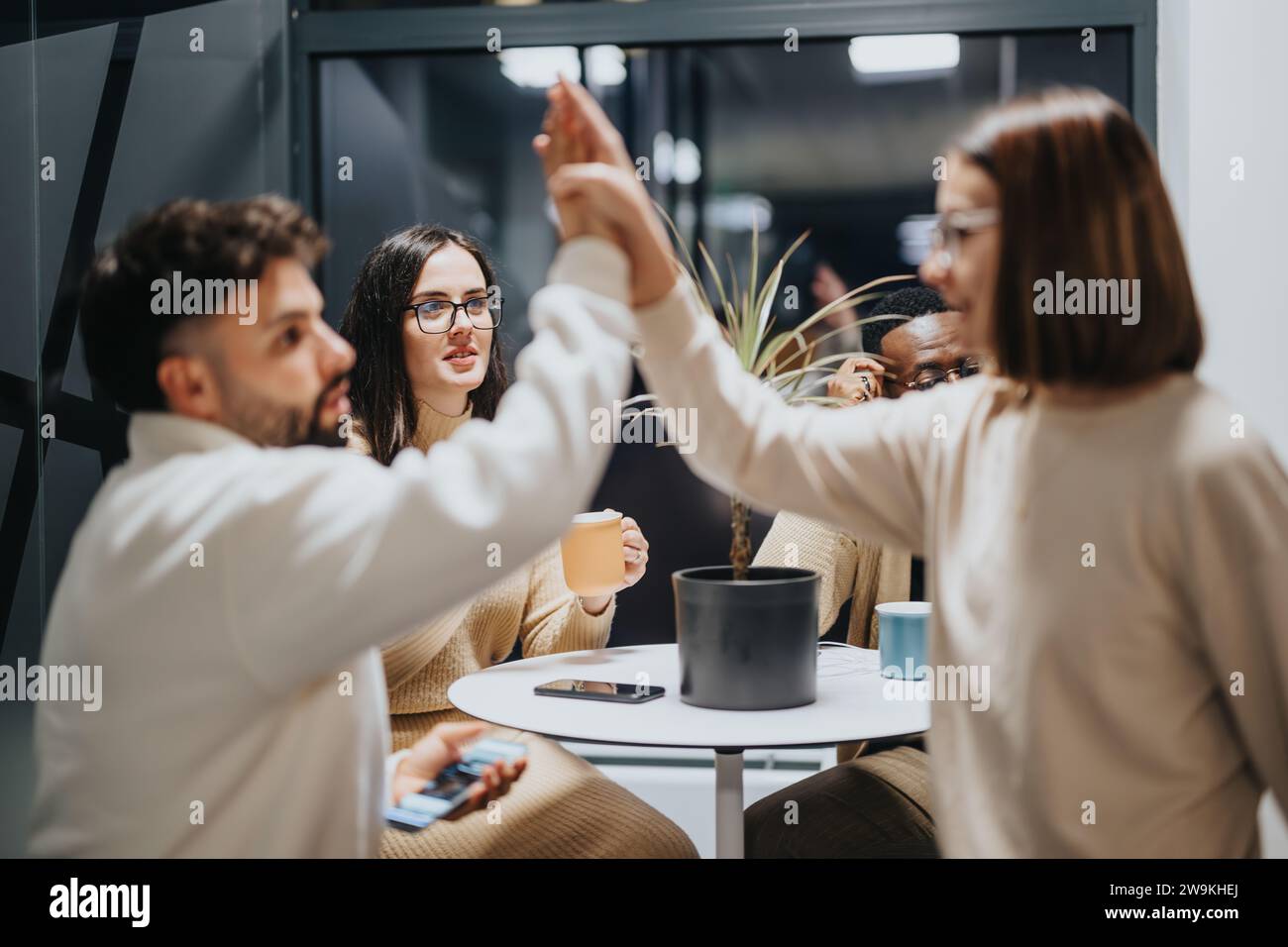 Young, multiracial coworkers taking a break together. They are enjoying ...