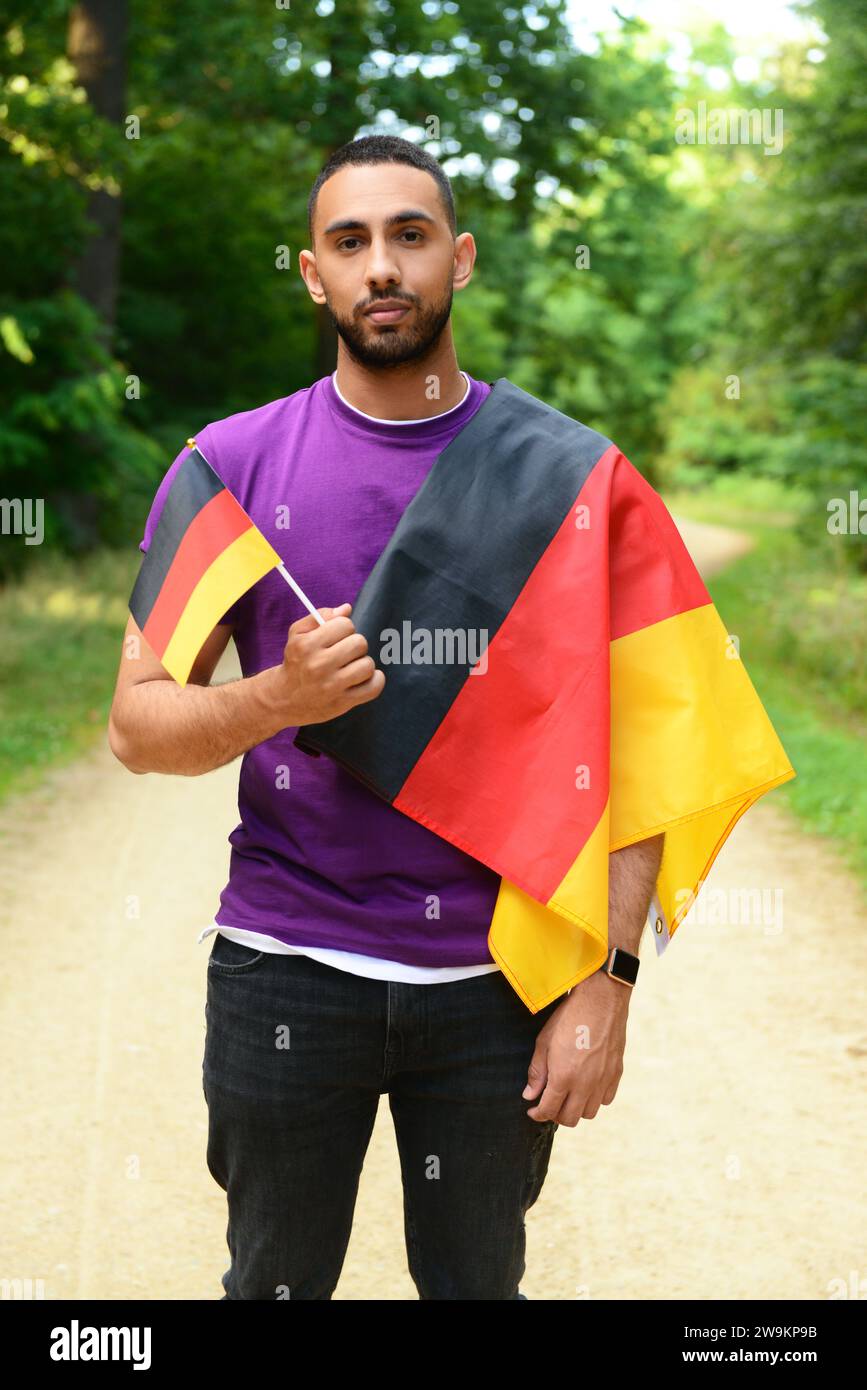 Happy caucasian man german flags hi-res stock photography and images ...