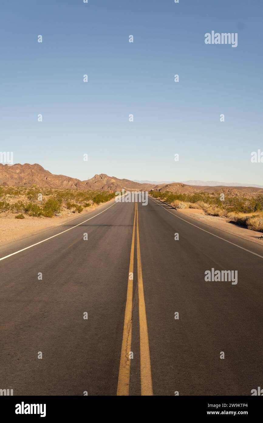 A single road through the desert Stock Photo - Alamy