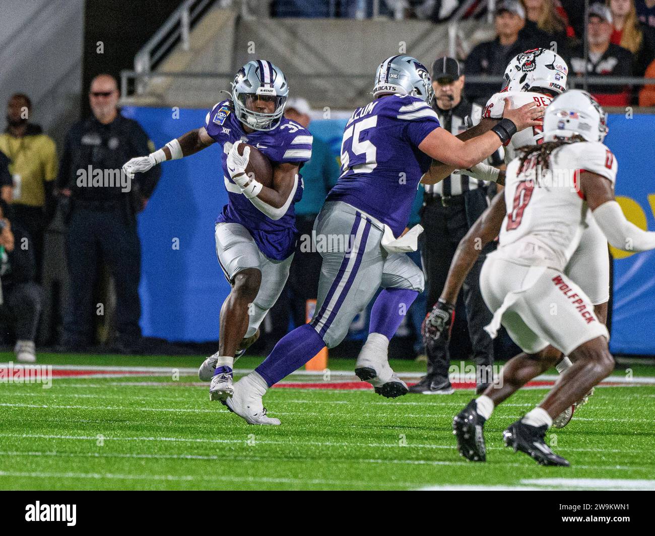 December 28, 2023: Kansas State running back DJ Giddens (31) runs with ...