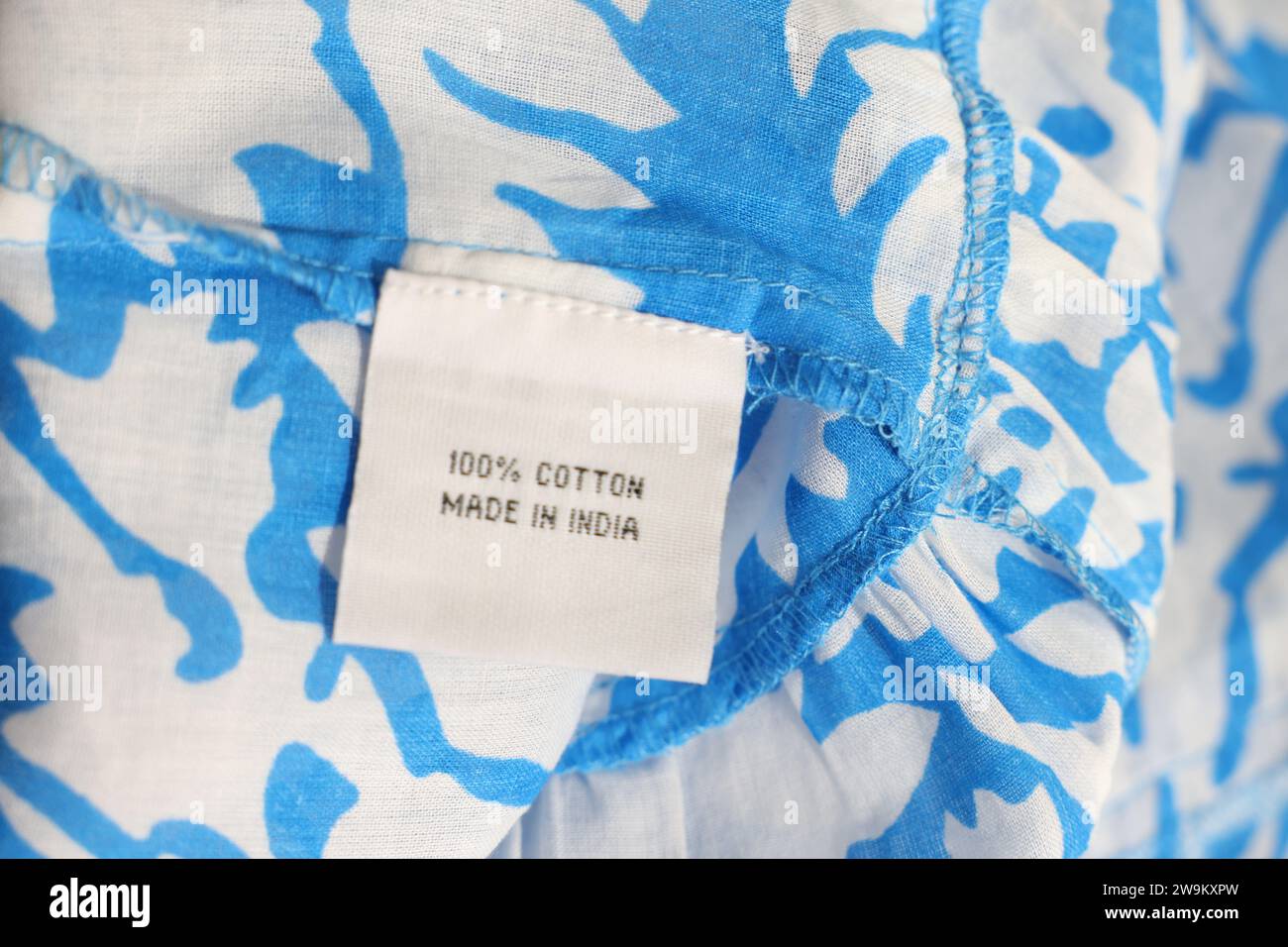 Clothing label on color garment, closeup view Stock Photo - Alamy