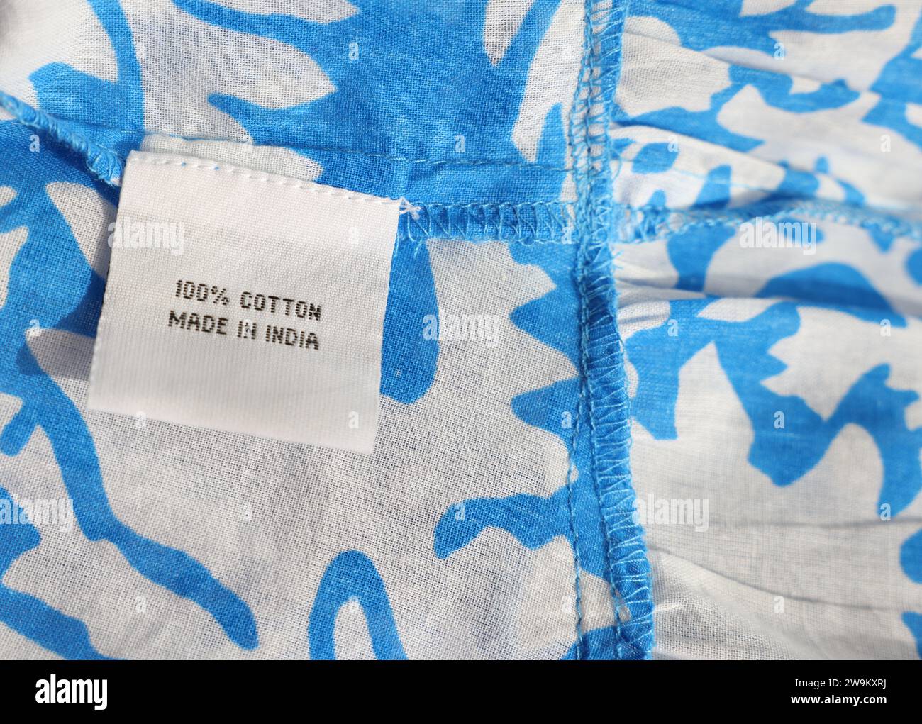 Clothing label on color garment, closeup view Stock Photo - Alamy