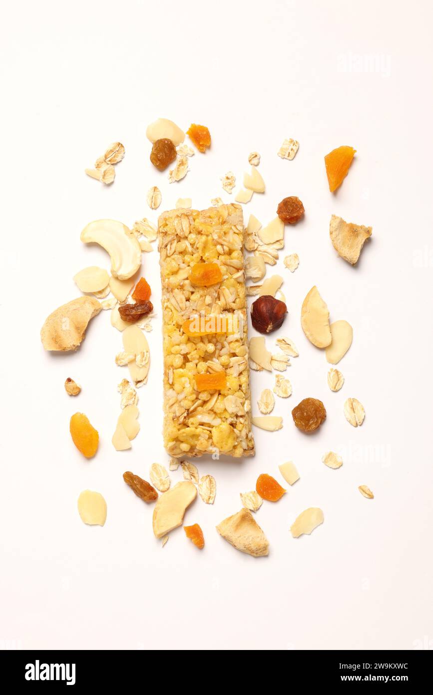 Tasty granola bar and ingredients isolated on white, top view Stock ...