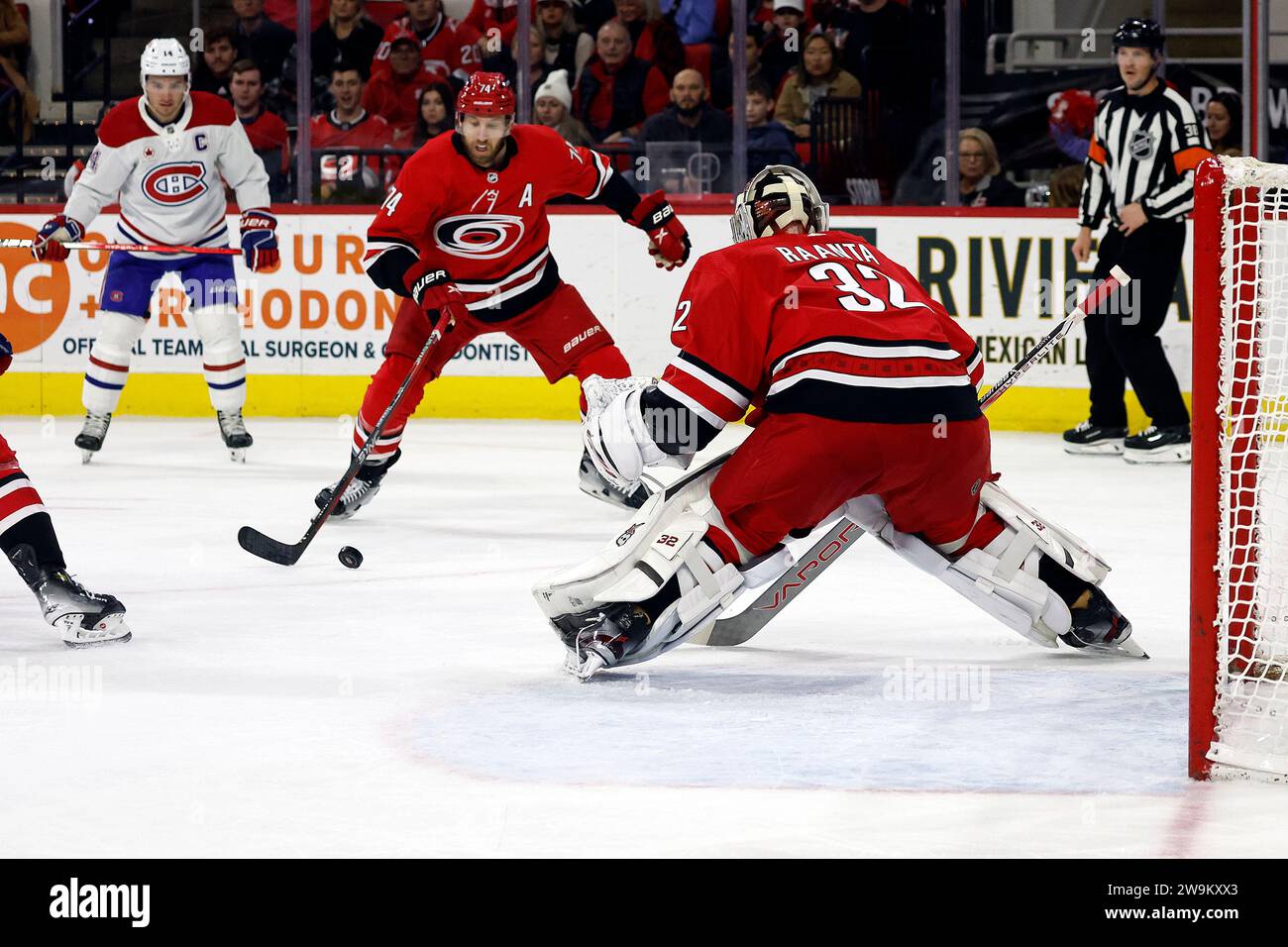 Carolina Hurricanes' Jaccob Slavin (74) gathers in a rebound from ...