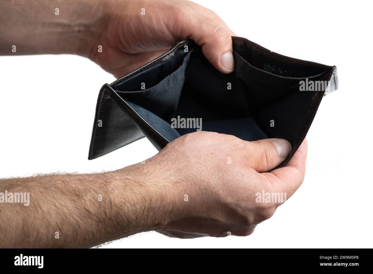 Hand holding an empty wallet Stock Photo - Alamy