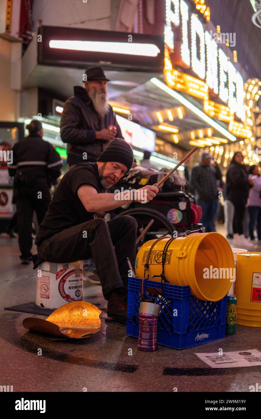 Man playing the drums with buckets on Fremont street in Las Vegas Stock ...