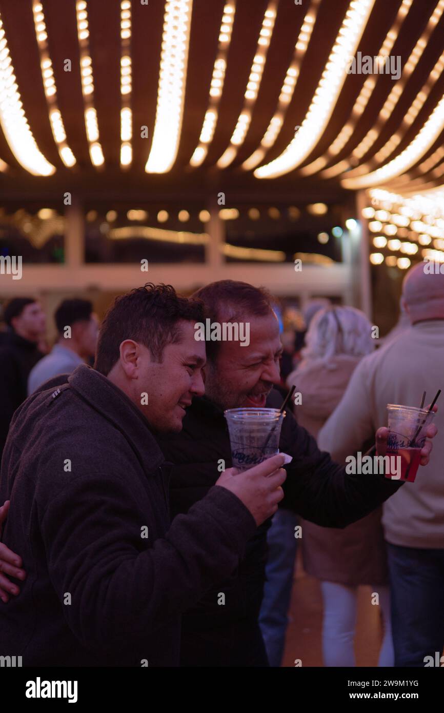 Friends interacting on Fremont street in Las Vegas Stock Photo - Alamy