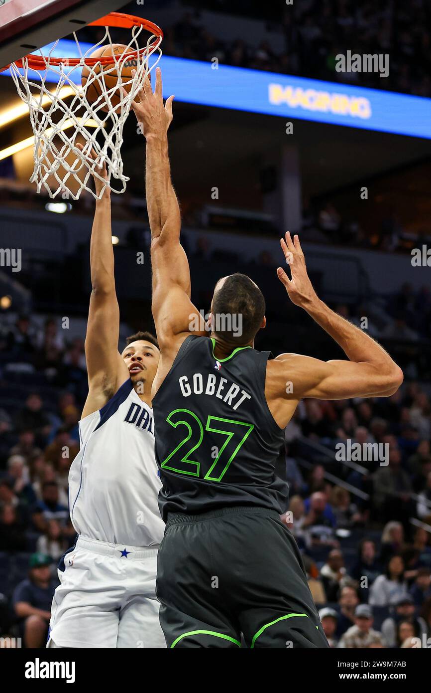 Minnesota Timberwolves center Rudy Gobert (27) goes up to block a shot by Dallas Mavericks guard ...