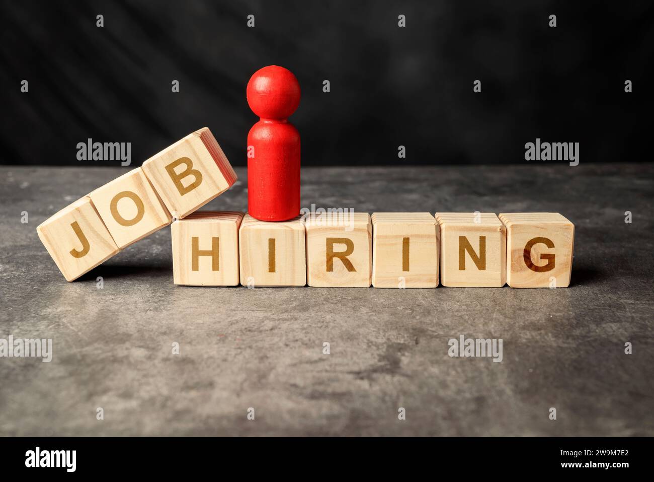 Wooden figures and cubes with JOB HIRING letter. Human resources ...