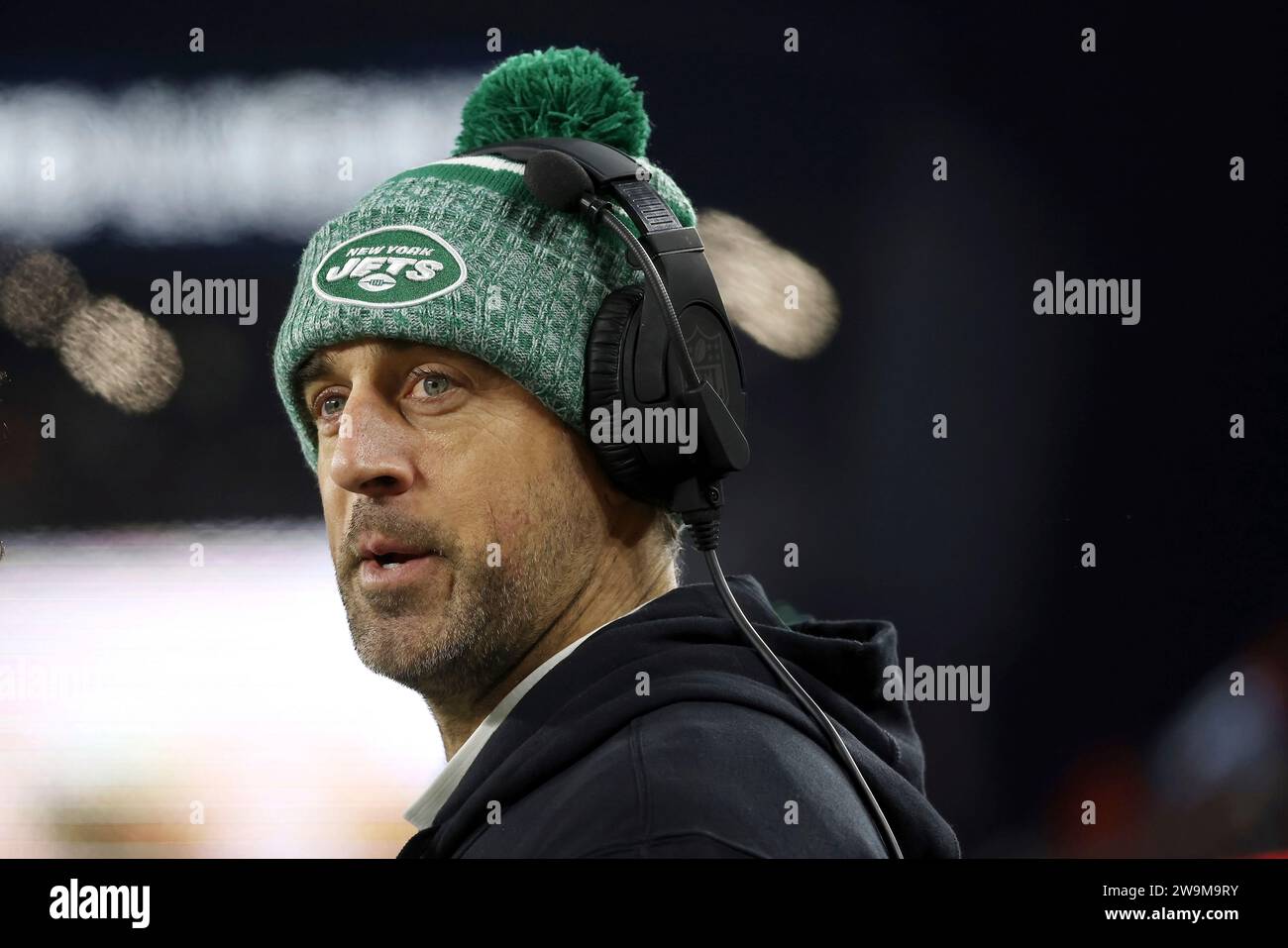 New York Jets quarterback Aaron Rodgers (8) stands on the sideline ...