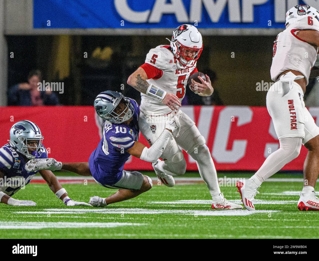December 28, 2023: NC State quarterback Brennan Armstrong (5) is ...