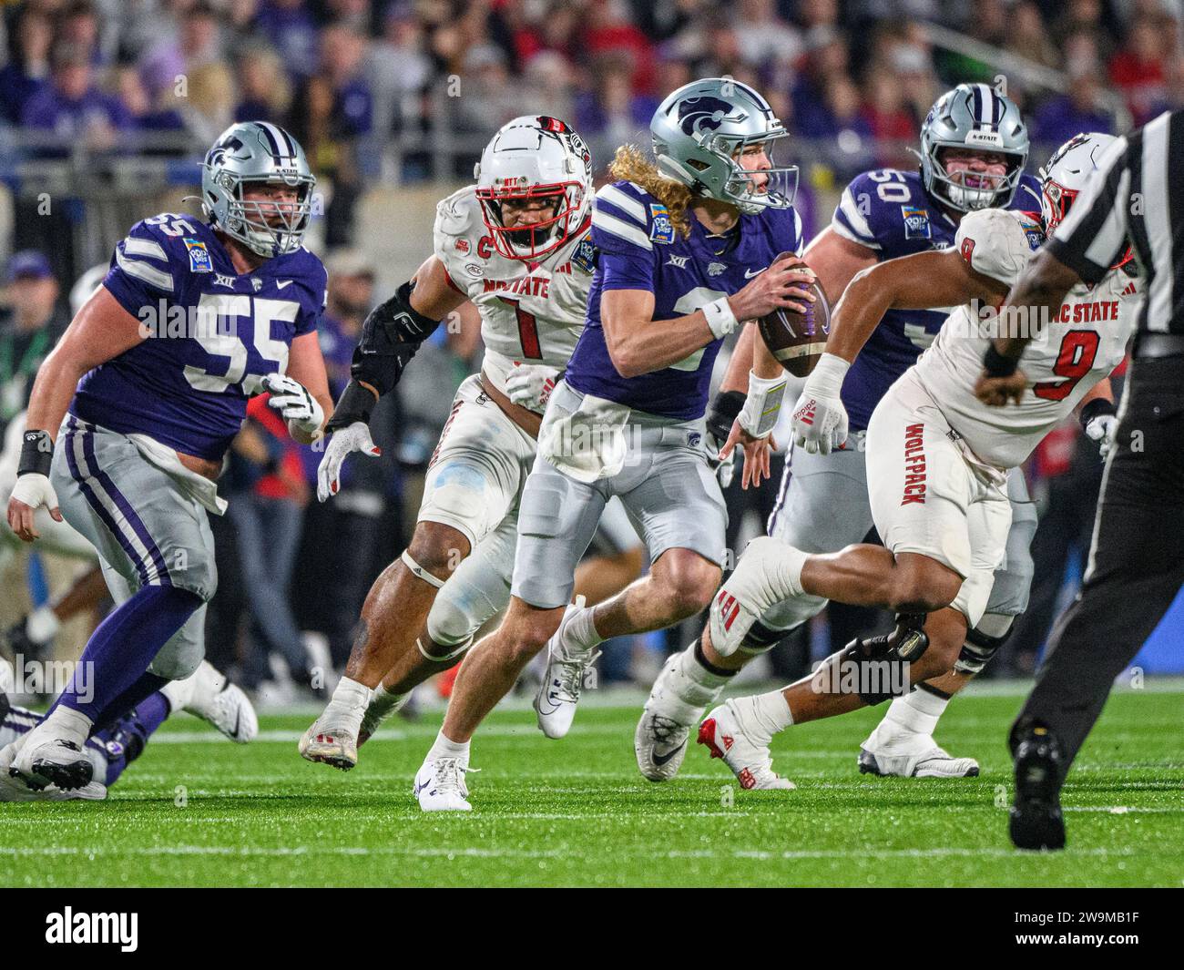 December 28, 2023: Kansas State quarterback Avery Johnson (2) scrambles ...