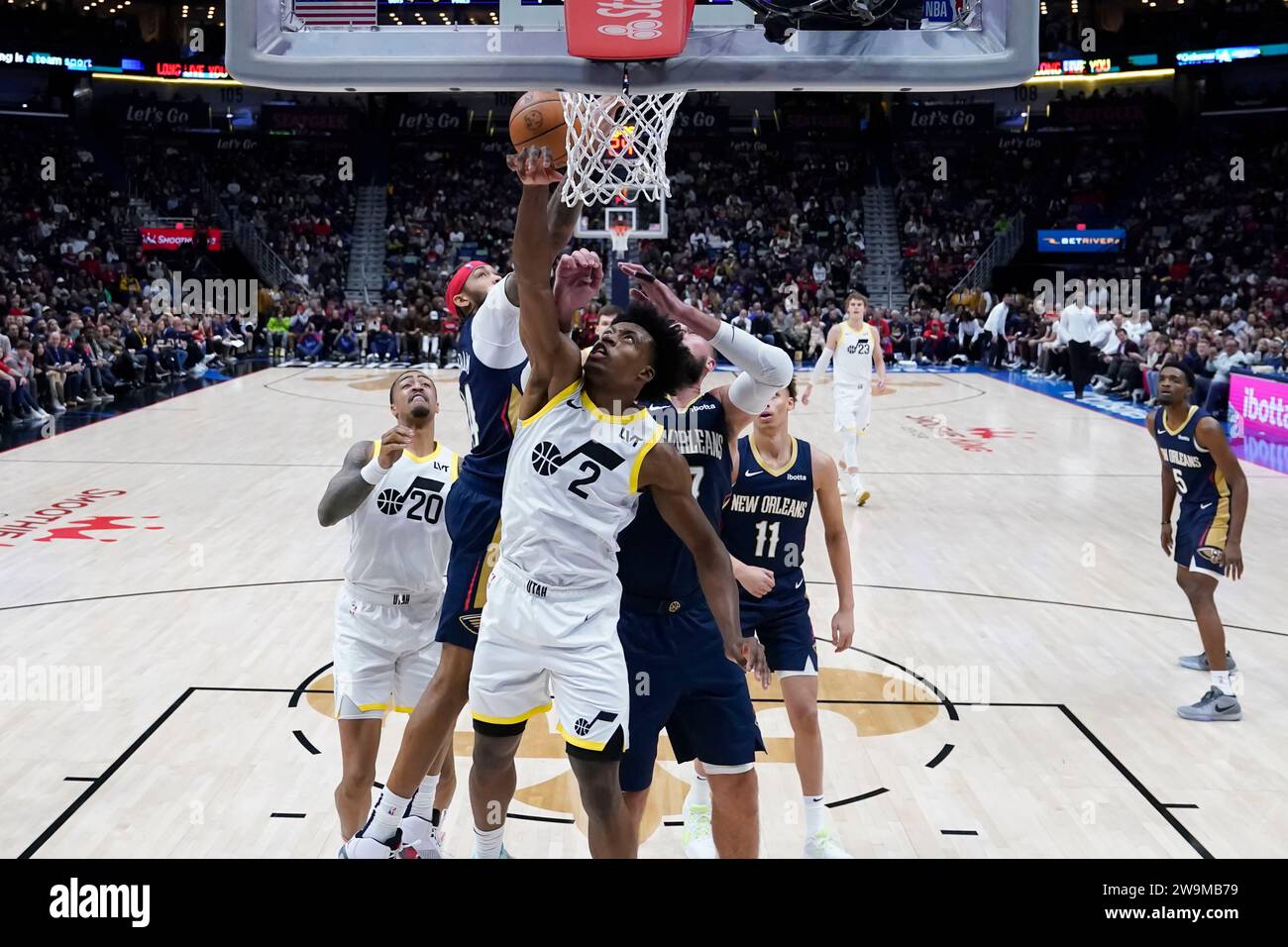 Utah Jazz guard Collin Sexton (2) battles for a rebound in the second ...