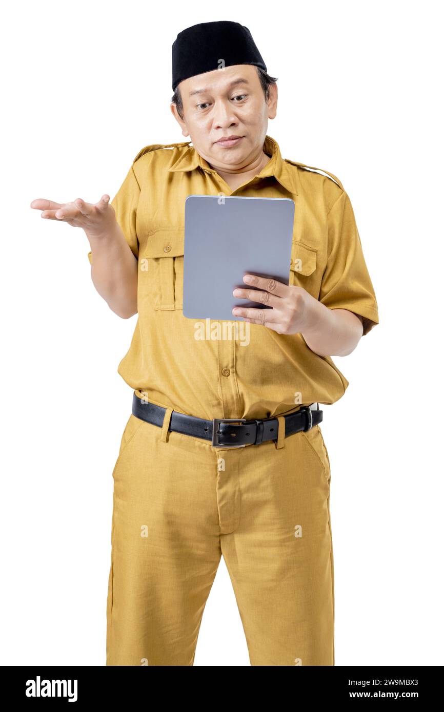 A civil servant man using a tablet isolated over a white background ...