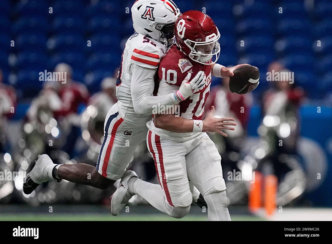 Oklahoma quarterback Jackson Arnold (10) is hit by Arizona defensive ...