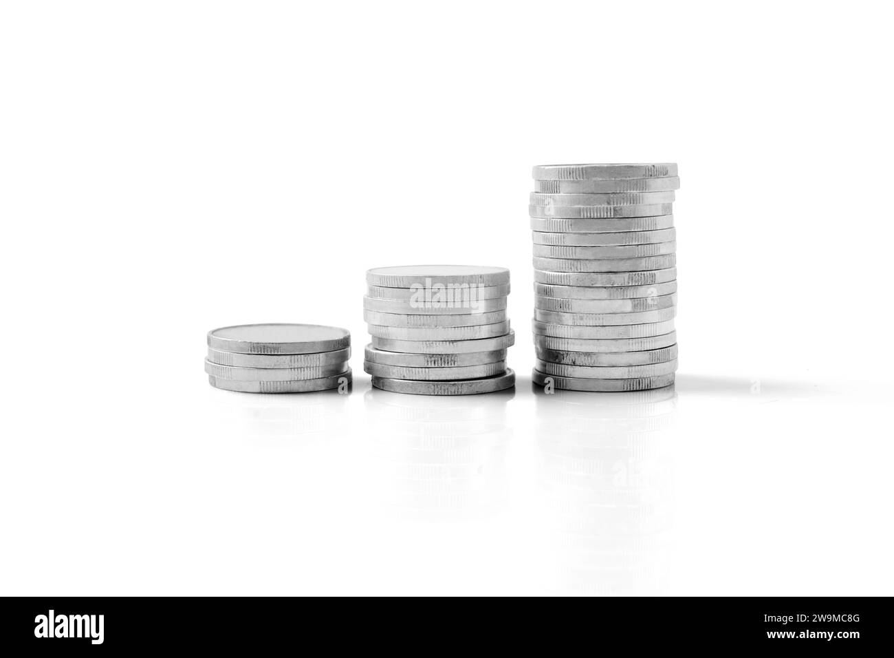 Closeup view stack of silver coins with stair pattern isolated over ...