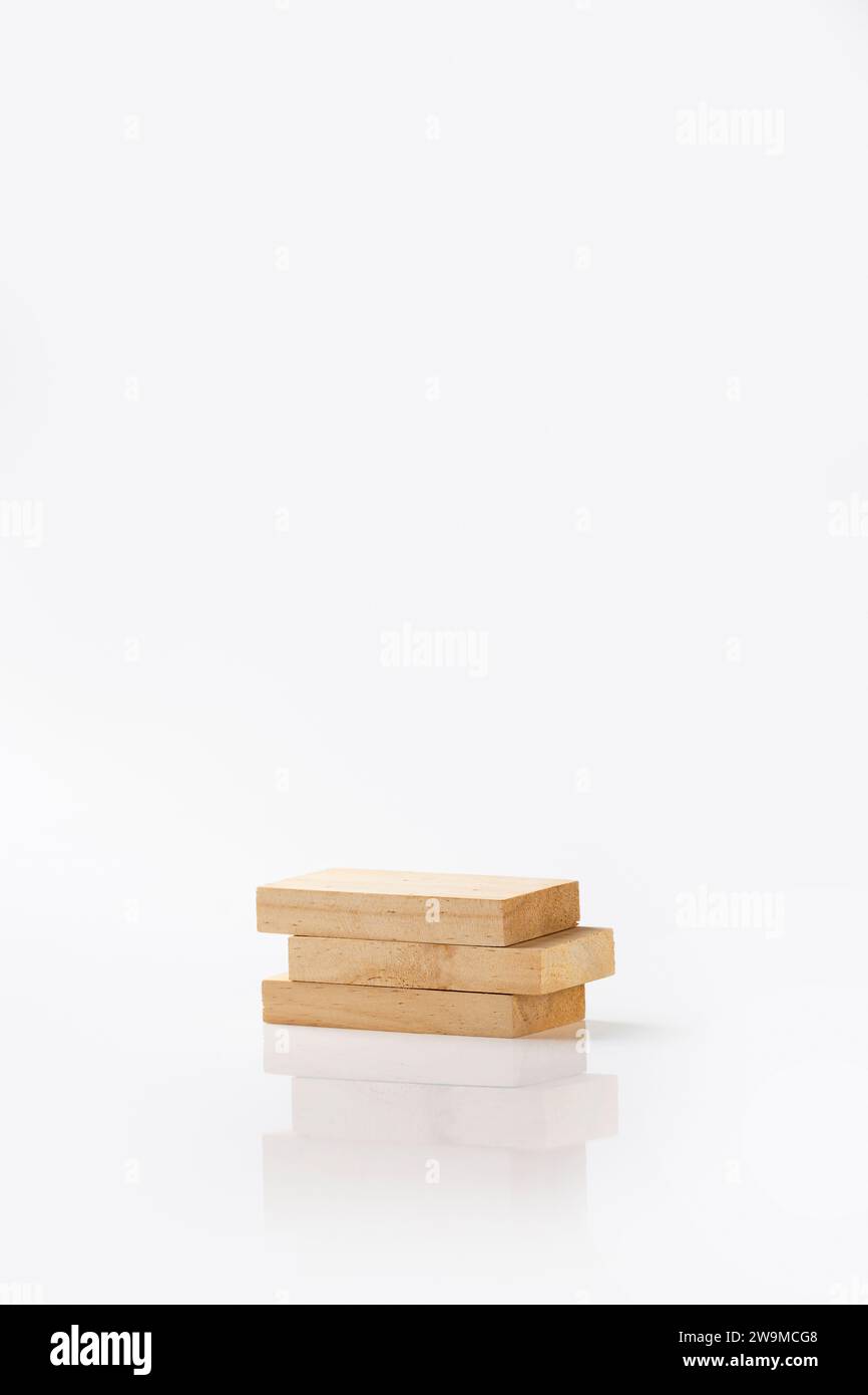 Stack of wooden blocks isolated over a white background Stock Photo - Alamy