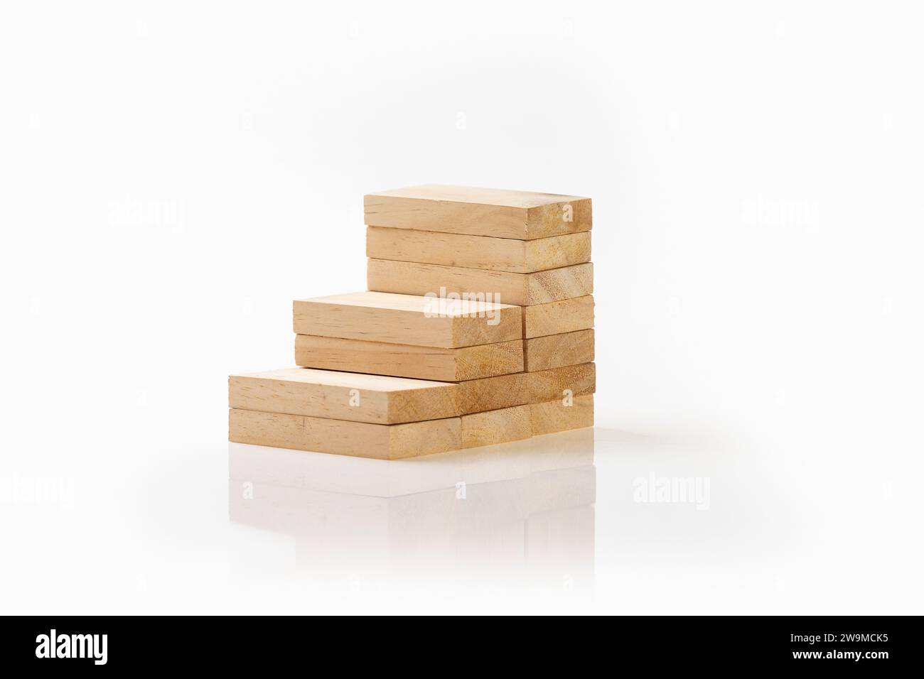 Stack of wooden blocks isolated over a white background Stock Photo - Alamy