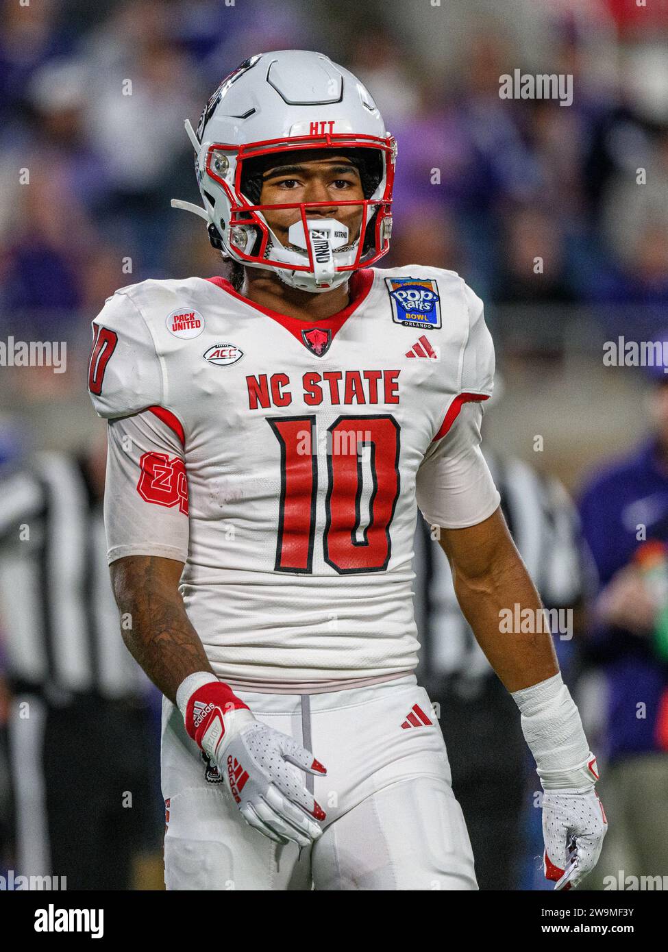 Orlando, FL, USA. 28th Dec, 2023. NC State wide receiver Kevin Concepcion (10) during first half ...