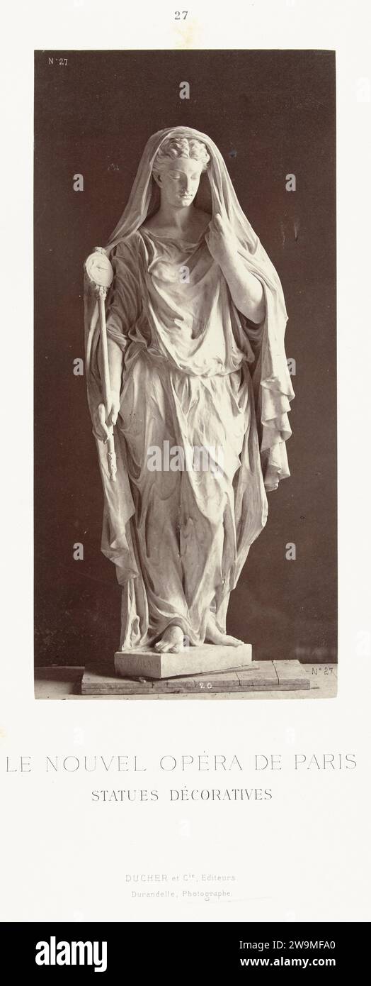 Marble statue of a veiled woman in a highly closed dress with a staff ...