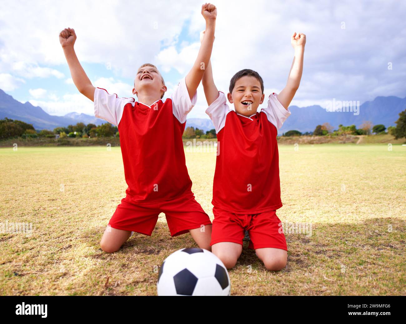 Children, soccer team and cheering for win and celebration, happy and ...
