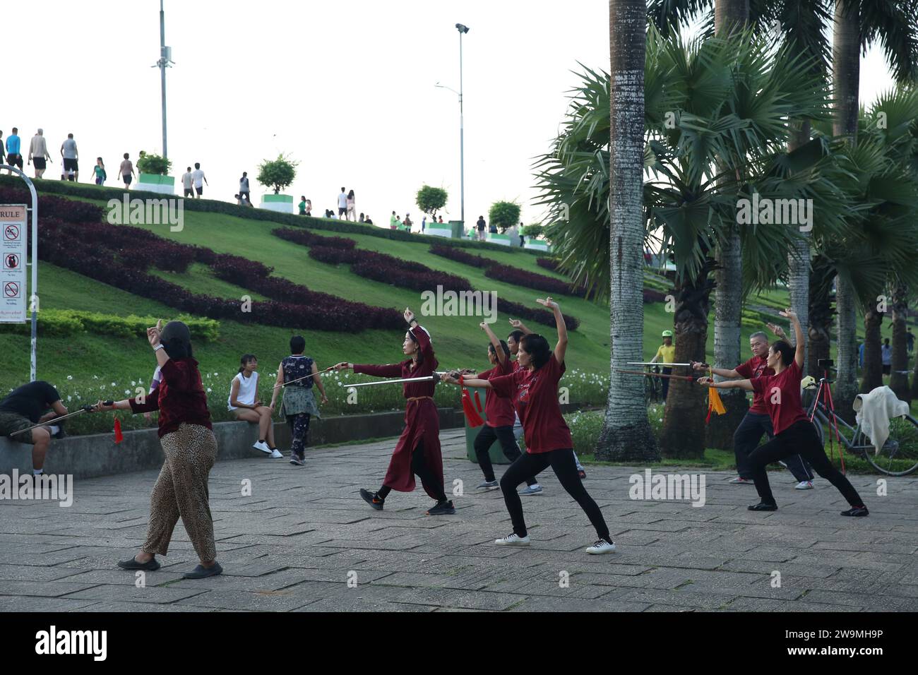 Yangon, Myanmar. 29th Dec, 2023. People practice Taijijian (Taiji sward ...