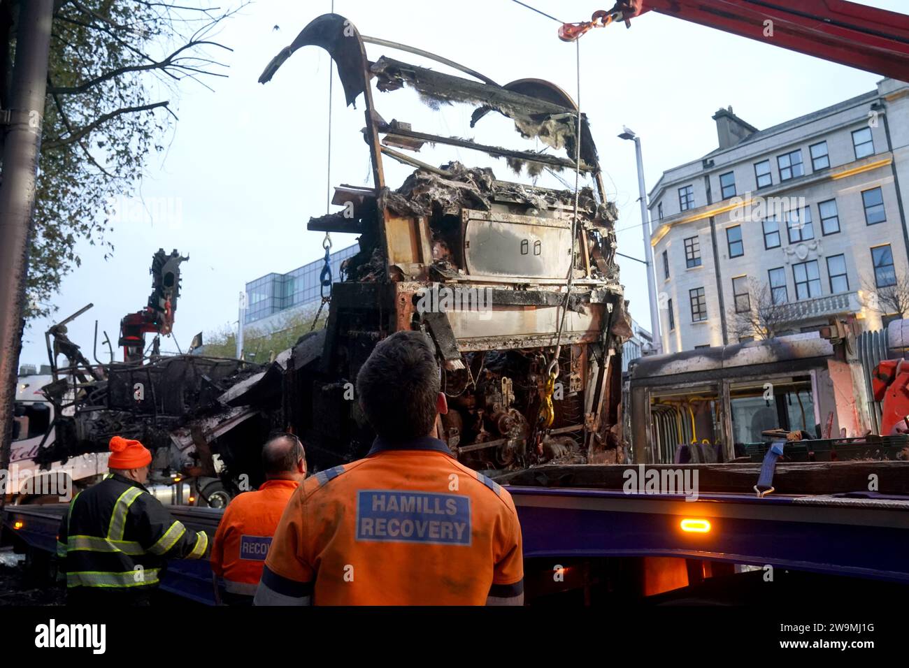 File photo dated 24/11/2023 of a burned out bus is removed from O ...