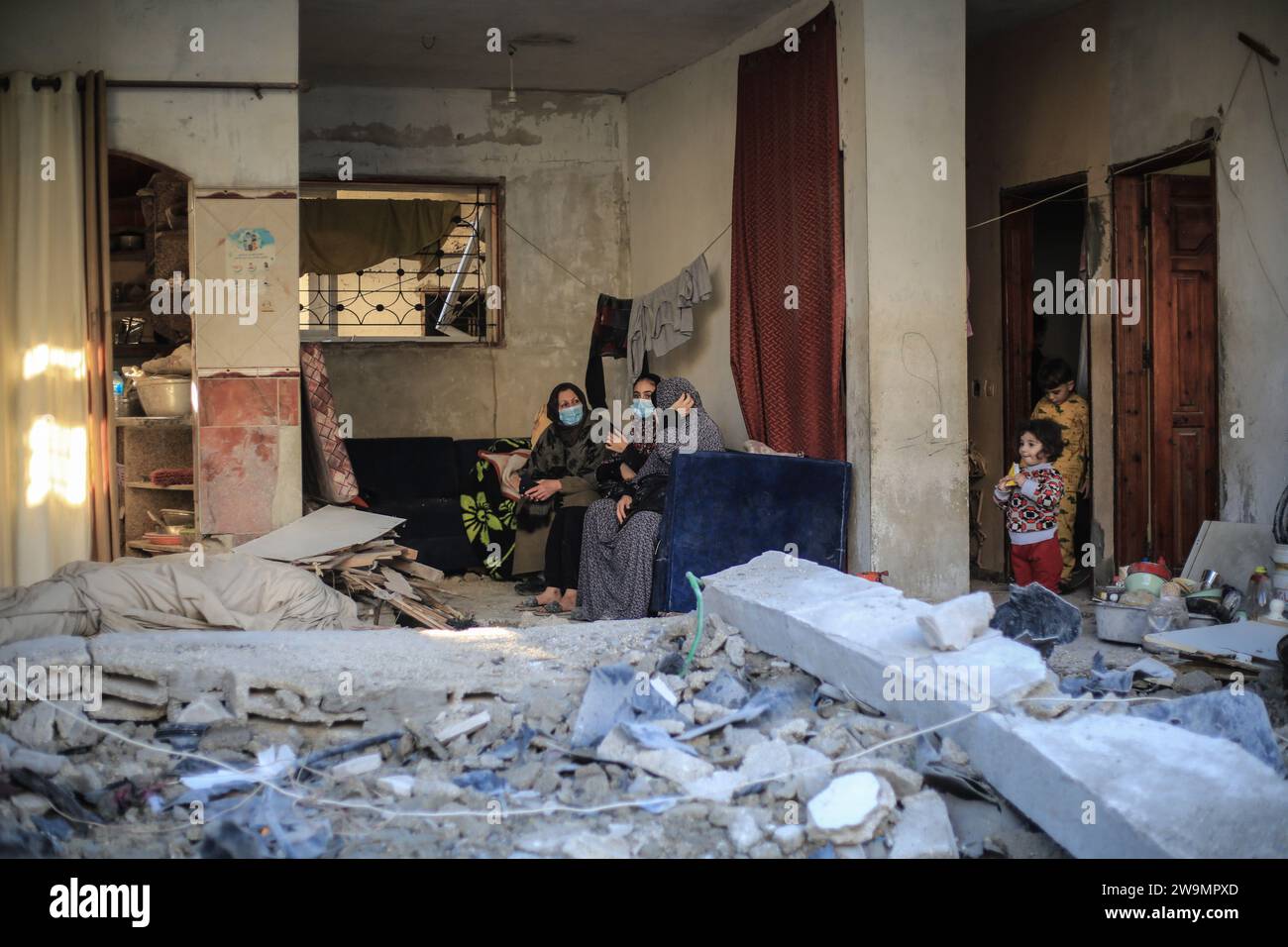 Rafah, Palestinian Territories. 29th Dec, 2023. People inspect a ...