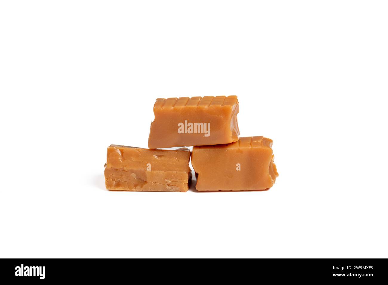 Delicious Caramel Candy Stacked like Bricks on White Background, Sweet ...