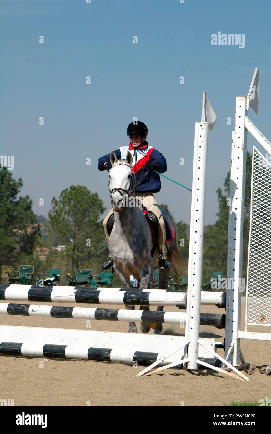 Teenage girl showjumping at an equestrian event, Johannesburg, South ...