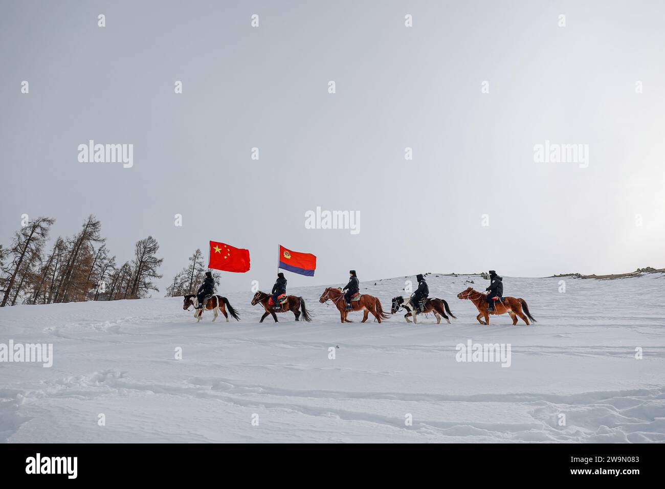 ALTAY, CHINA - DECEMBER 29, 2023 - Police officers at a border police ...