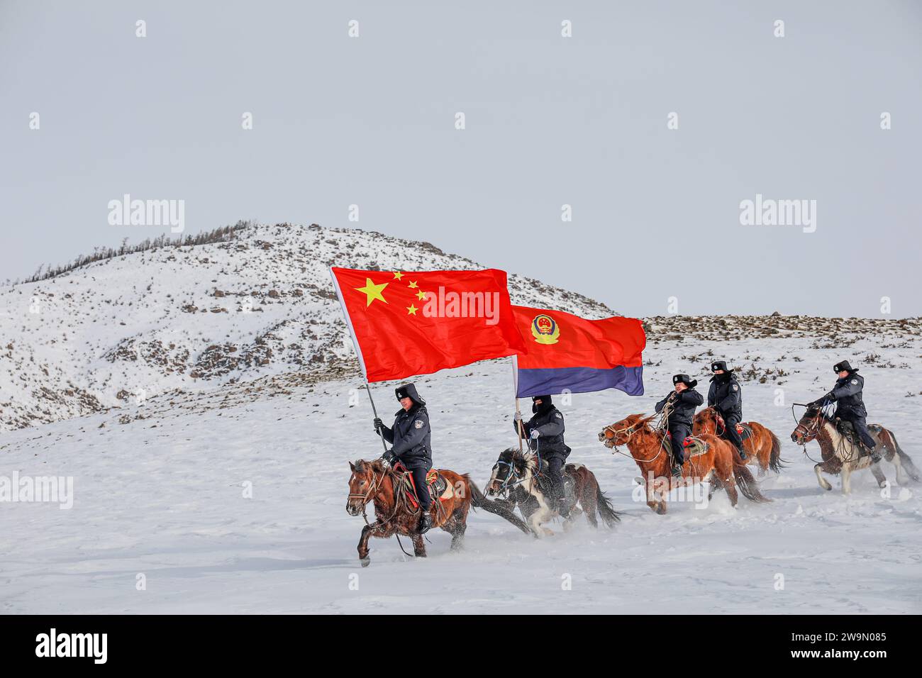 ALTAY, CHINA - DECEMBER 29, 2023 - Police officers at a border police ...