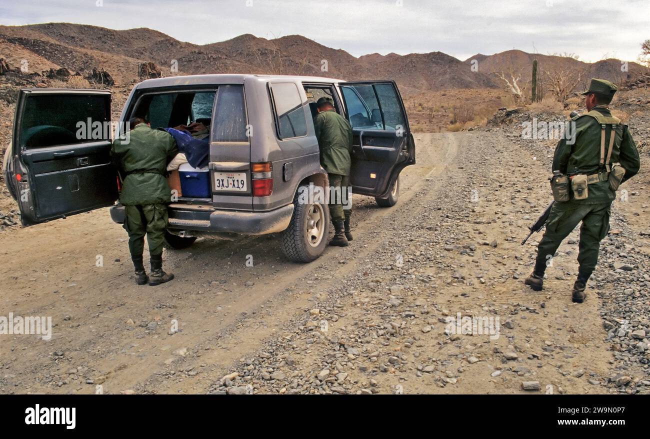 Military checkpoint on dirt road in remote area near Cocos Corner, Baja ...