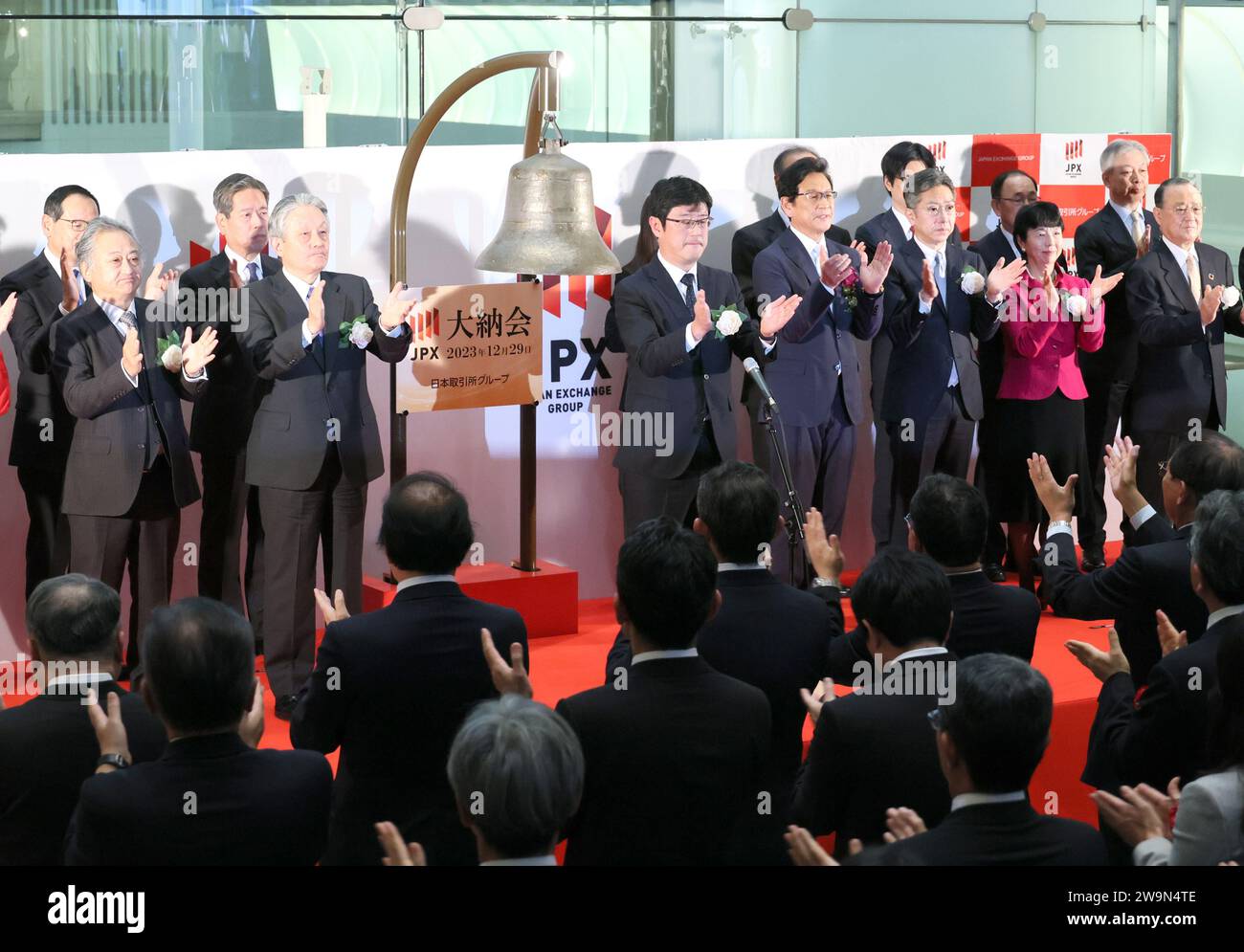 Tokyo, Japan. 29th Dec, 2023. Japan Exchange Group (JPX) executives ...
