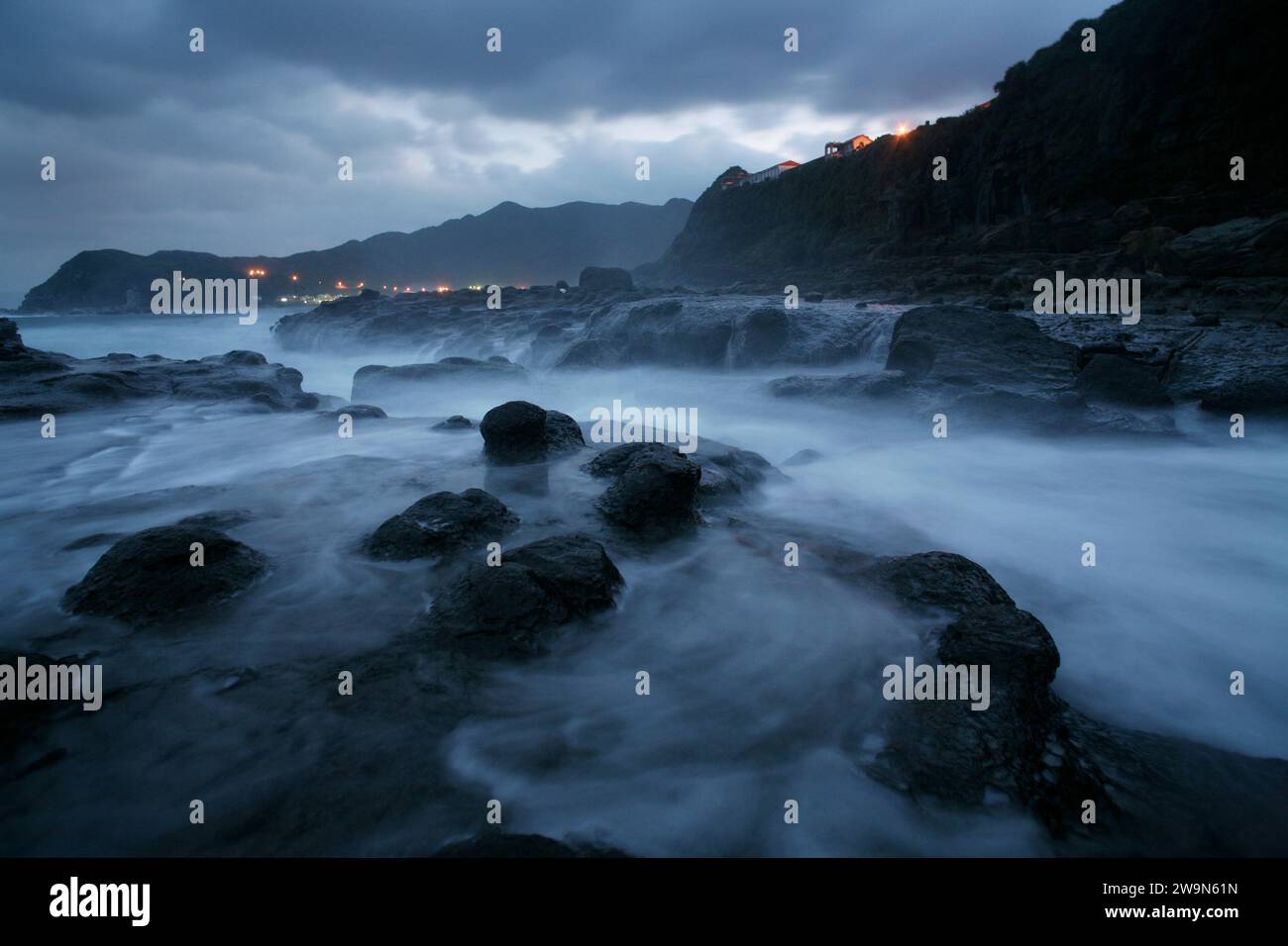 Unique rock formations sit in a wash of wave on Taiwan's northeast ...