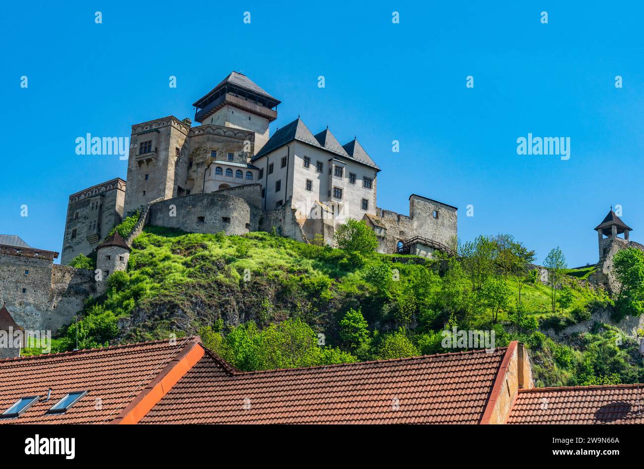 Looking up to Trencin castle in Slovakia Stock Photo - Alamy